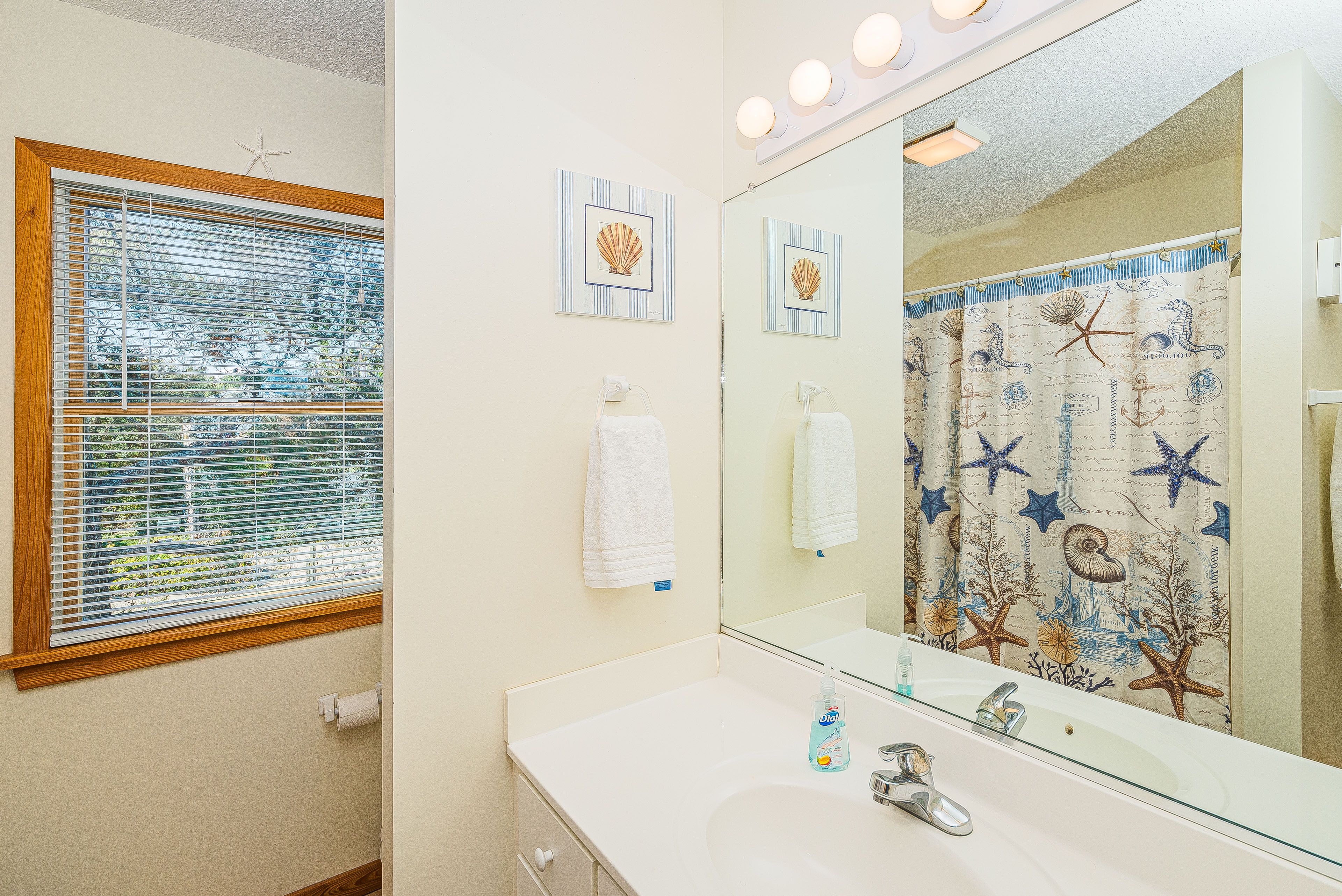 Book Latitude Adjustment | Oceanside OBX Vacation Rental